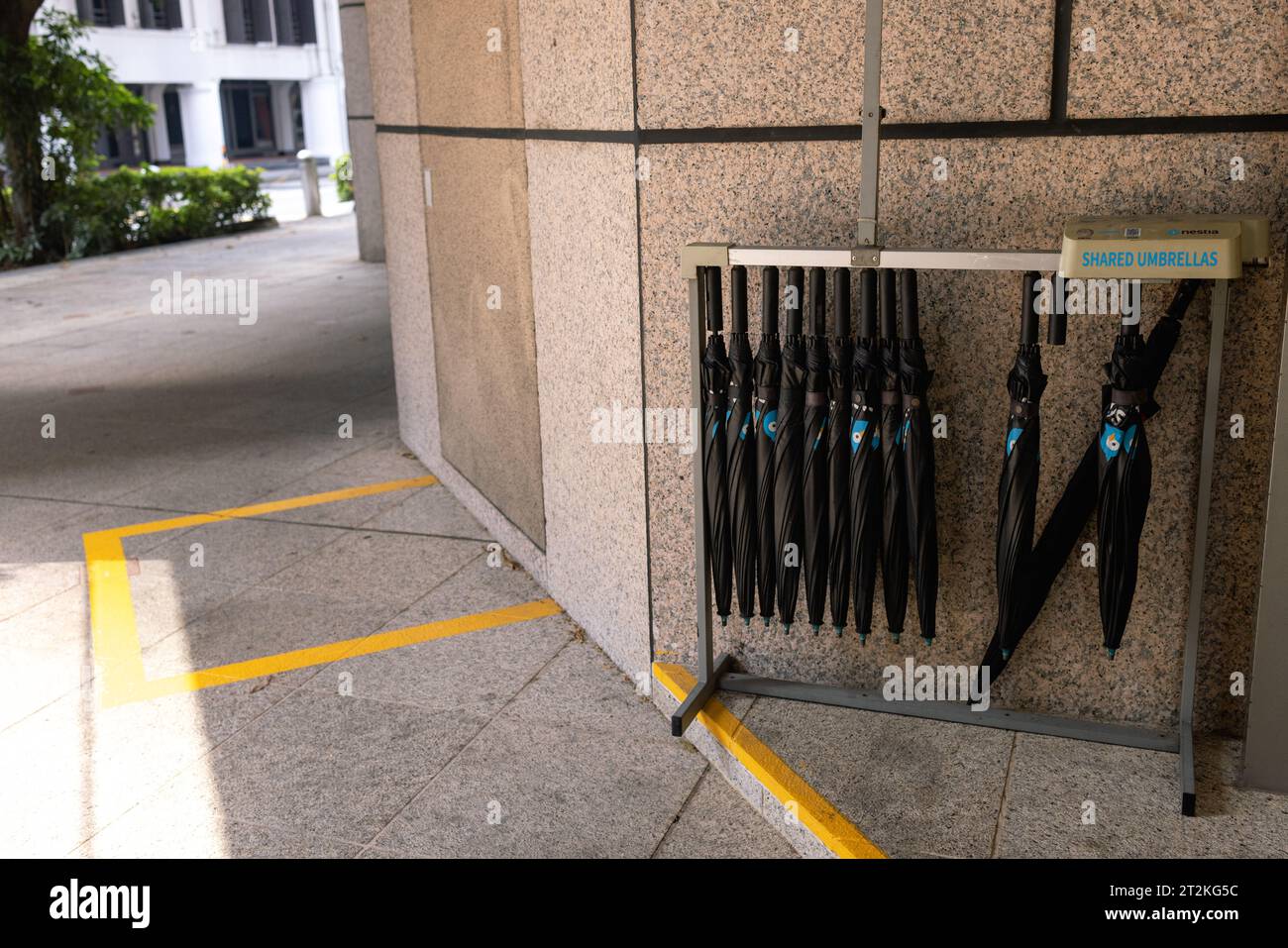 Singapore, 08 october 2023: Shared umbrellas service on the streets of ...