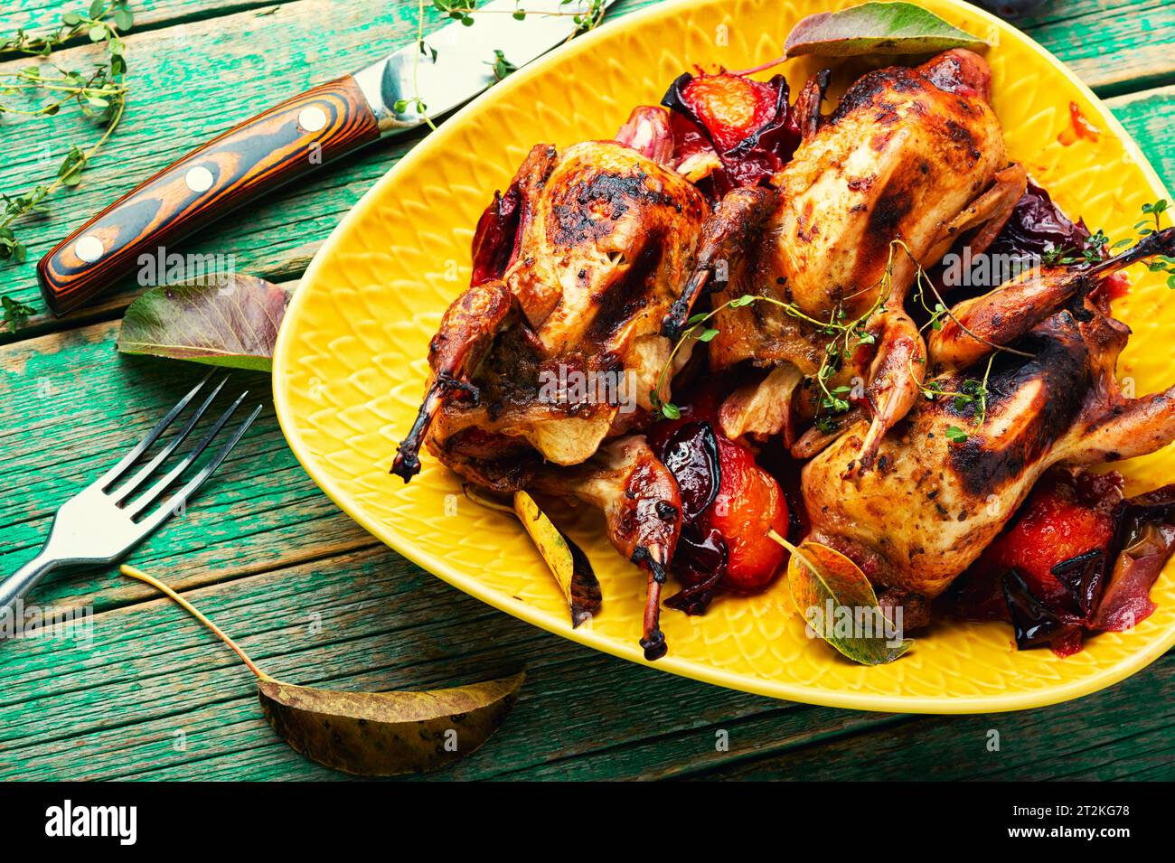 Juicy fried quail, dietary meat. Fried quail pickled in plum Stock ...