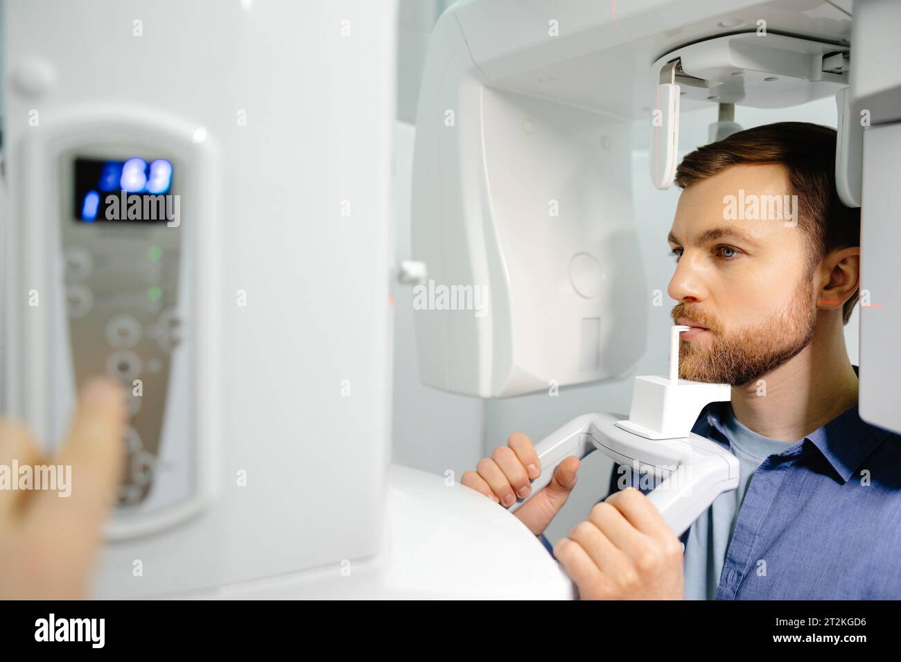 Panoramic image of teeth. A patient in a modern dental clinic takes a ...