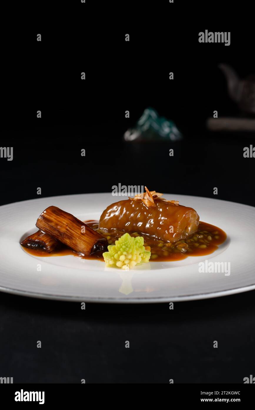 Braised Sea Cucumber with Scallions Recipe Stock Photo - Alamy