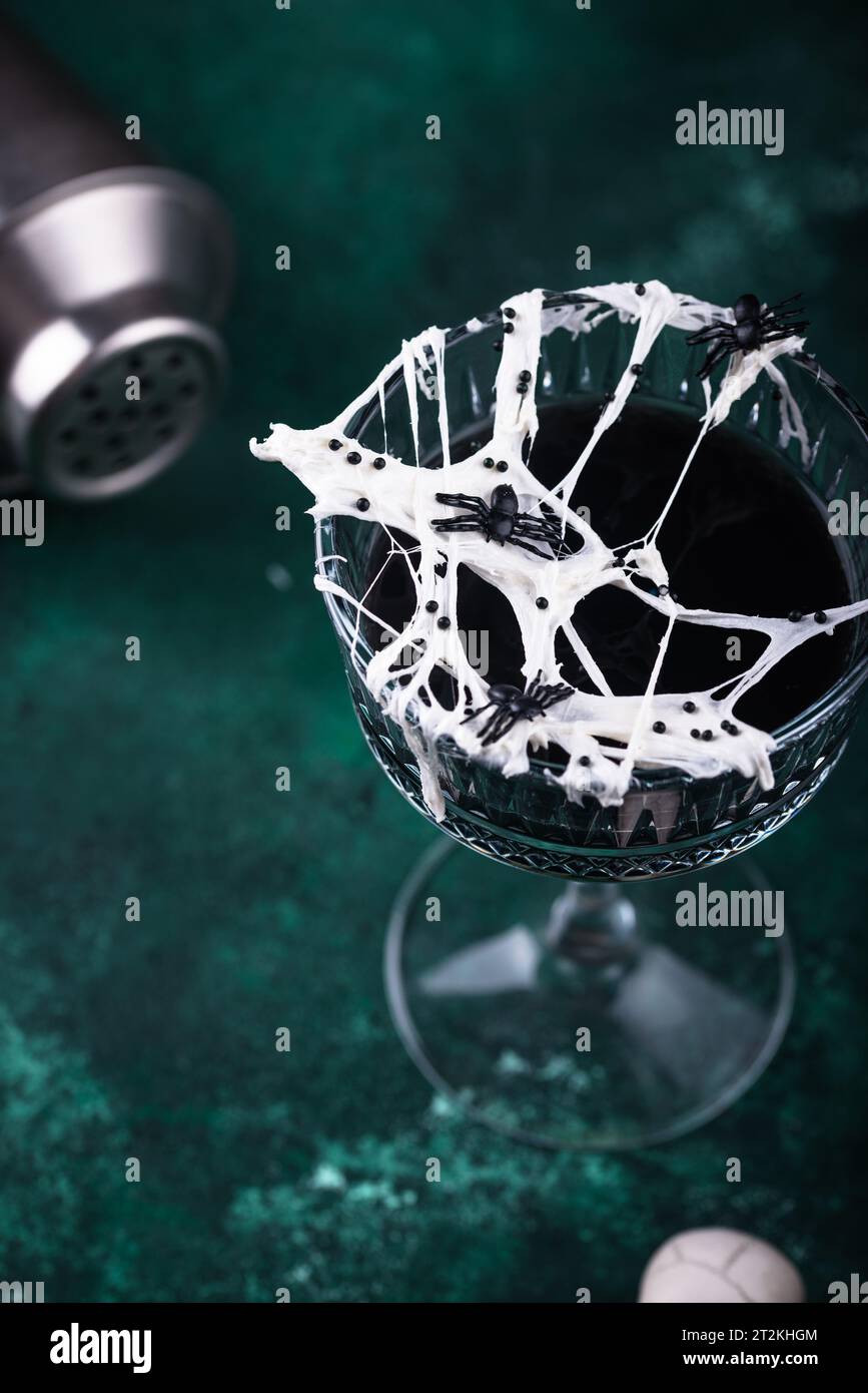 Halloween cocktail with spider cobweb Stock Photo - Alamy