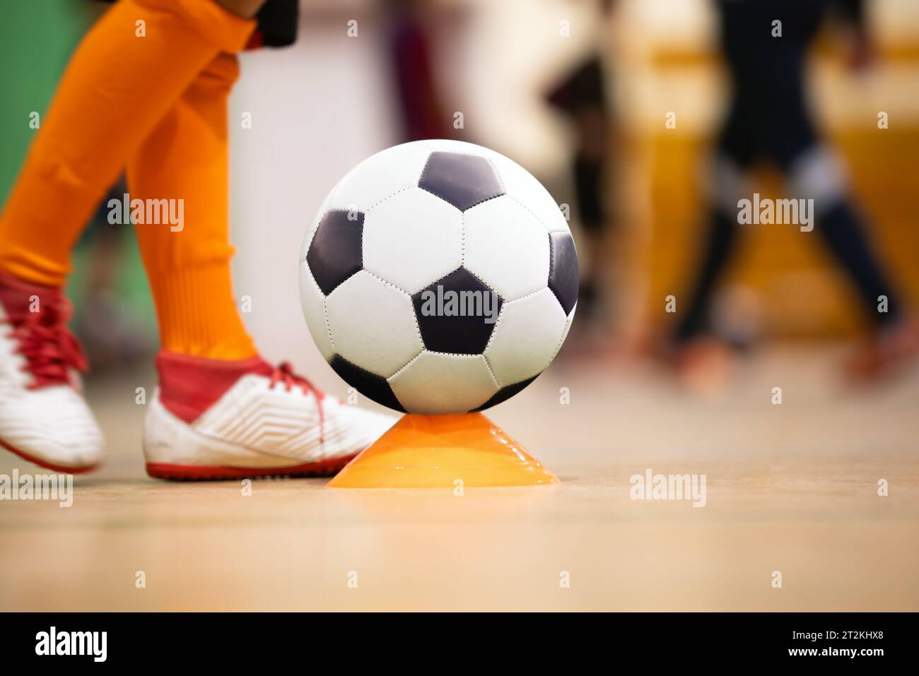 Boy in Soccer Clothes with Futsal Ball on Dribbling Drill. Kid on ...