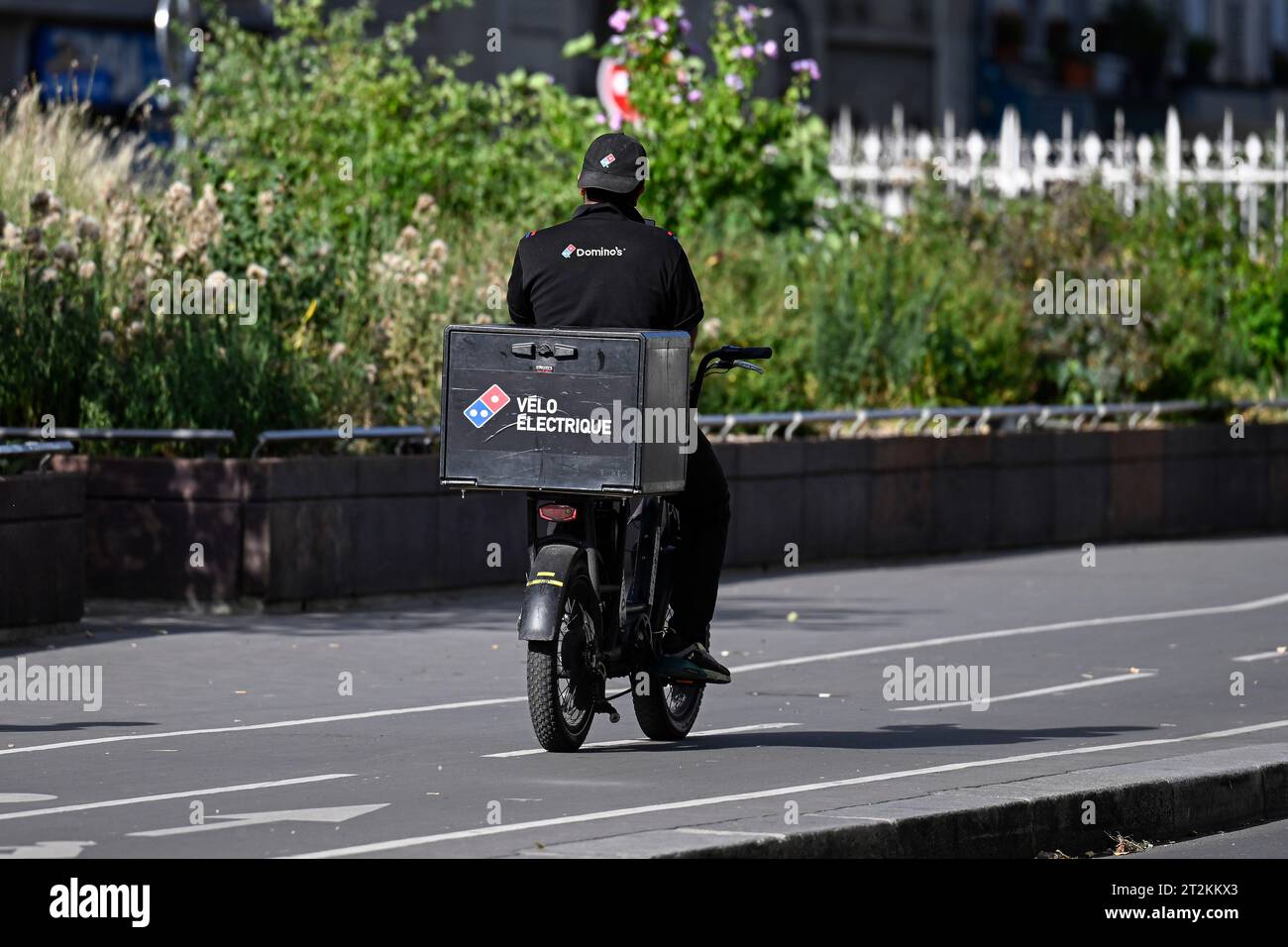 Paris, France. 19th Oct, 2023. A deliver for Domino's Pizza on his bike ...