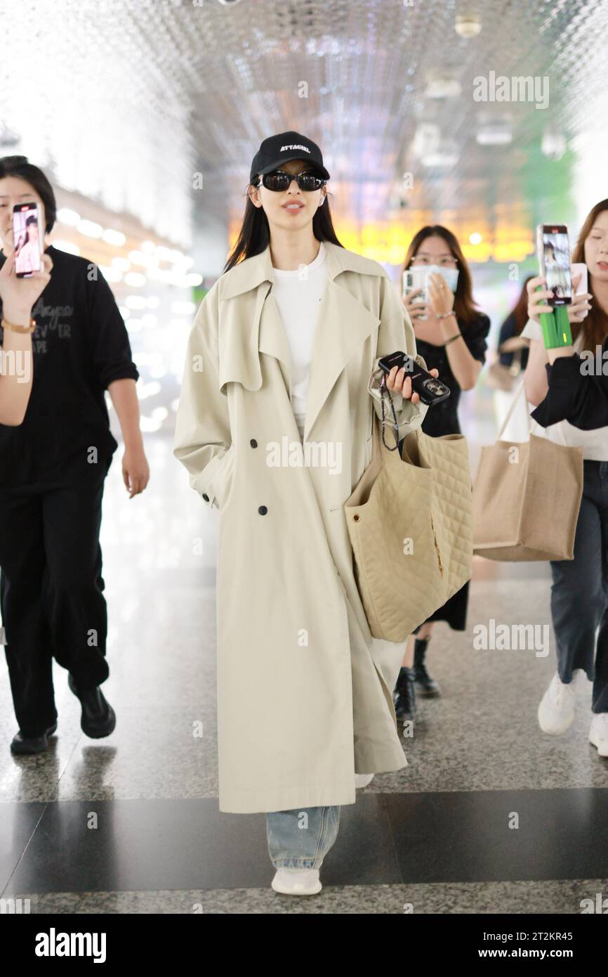 Chinese actress Zhang Li appears at the airport in Guangzhou City ...