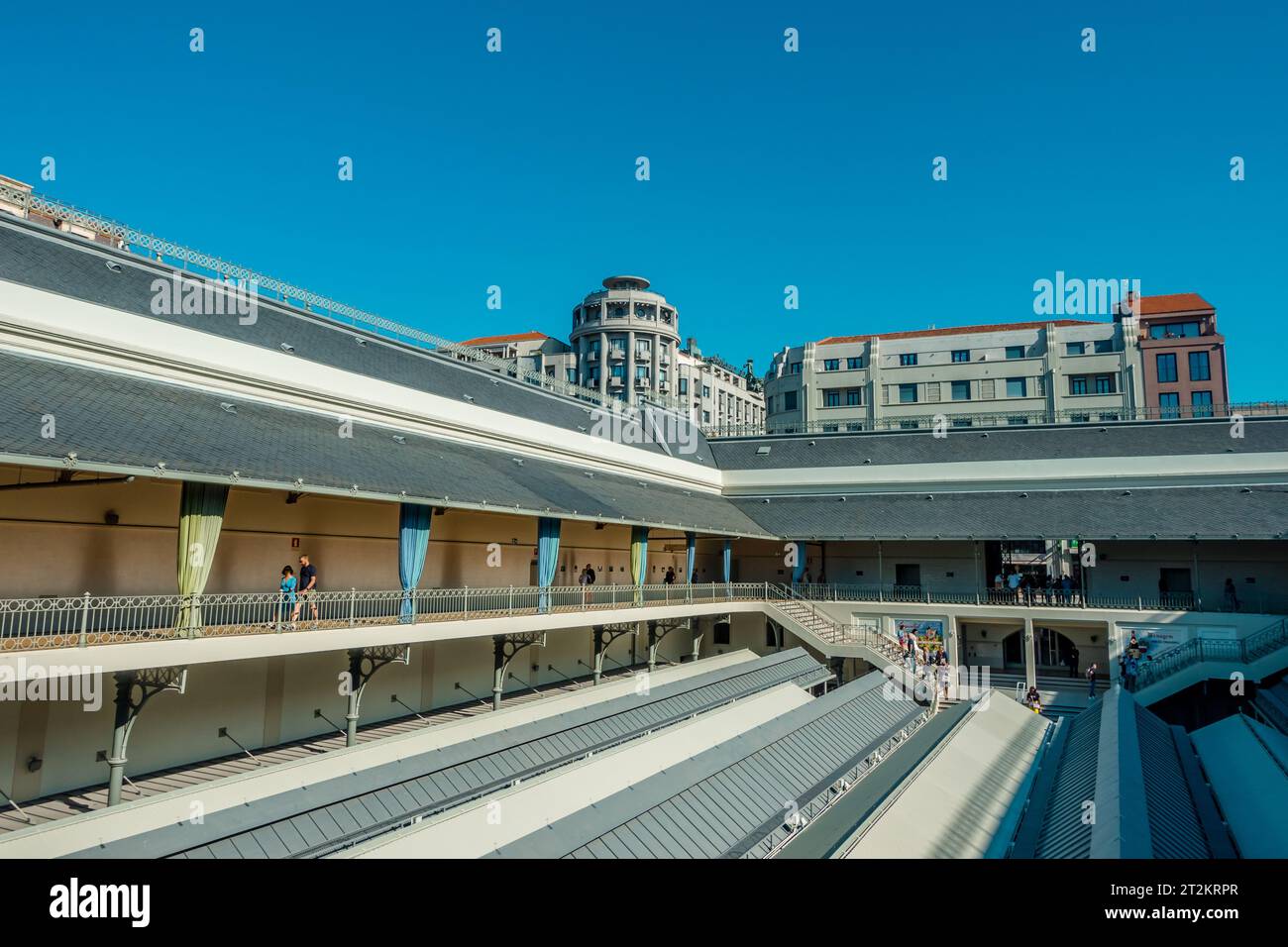 Aerial view of a modern, open-air atrium in a commercial building ...