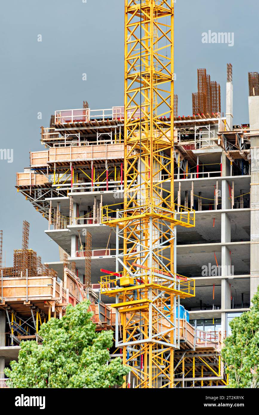 Construction of concrete high rise residential building with the crane ...