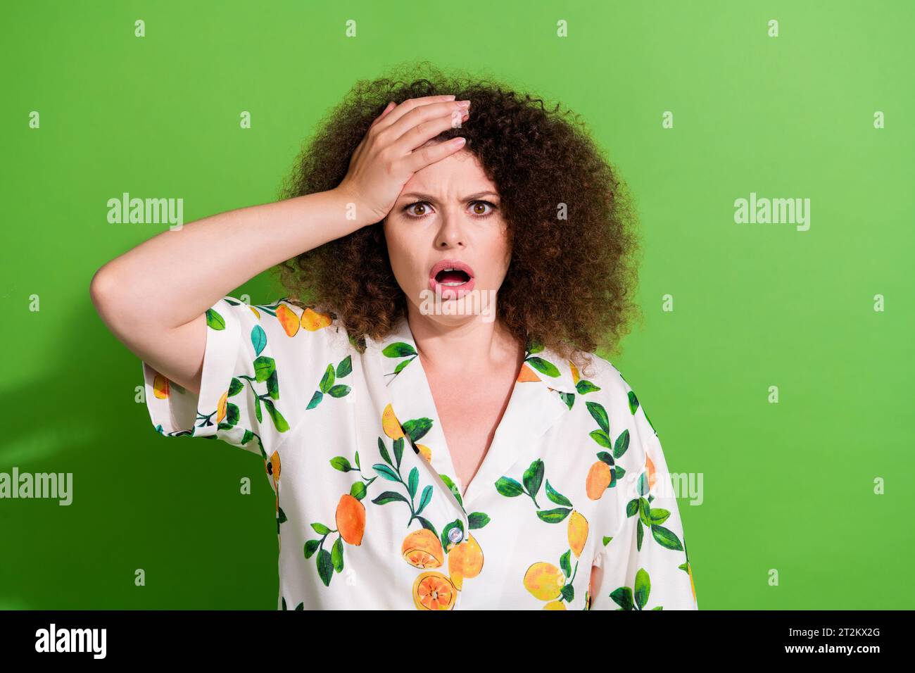 Photo of speechless unsatisfied girl arm touch head open mouth ...