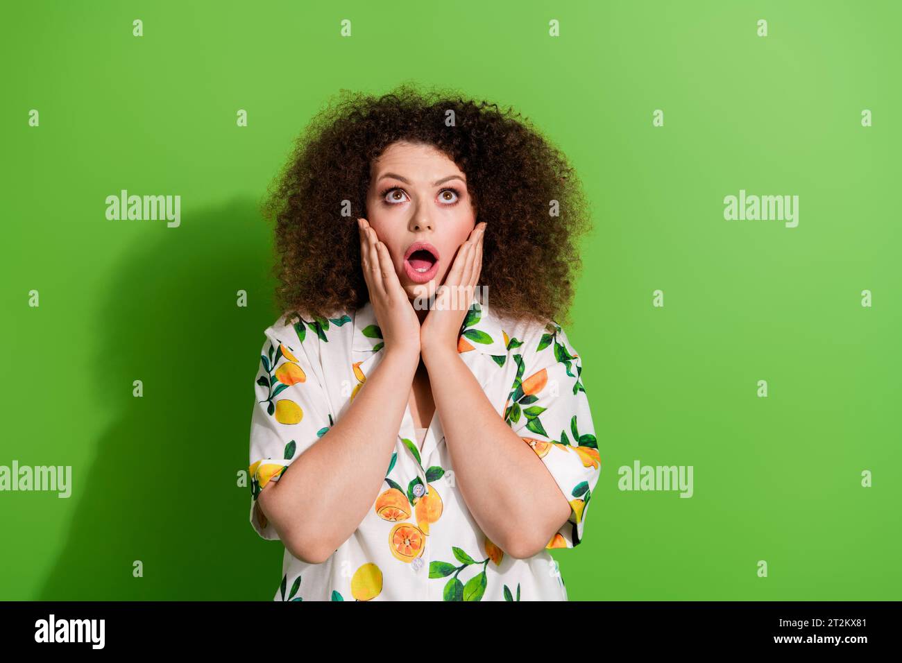 Photo of impressed speechless person arms touch cheekbones open mouth ...