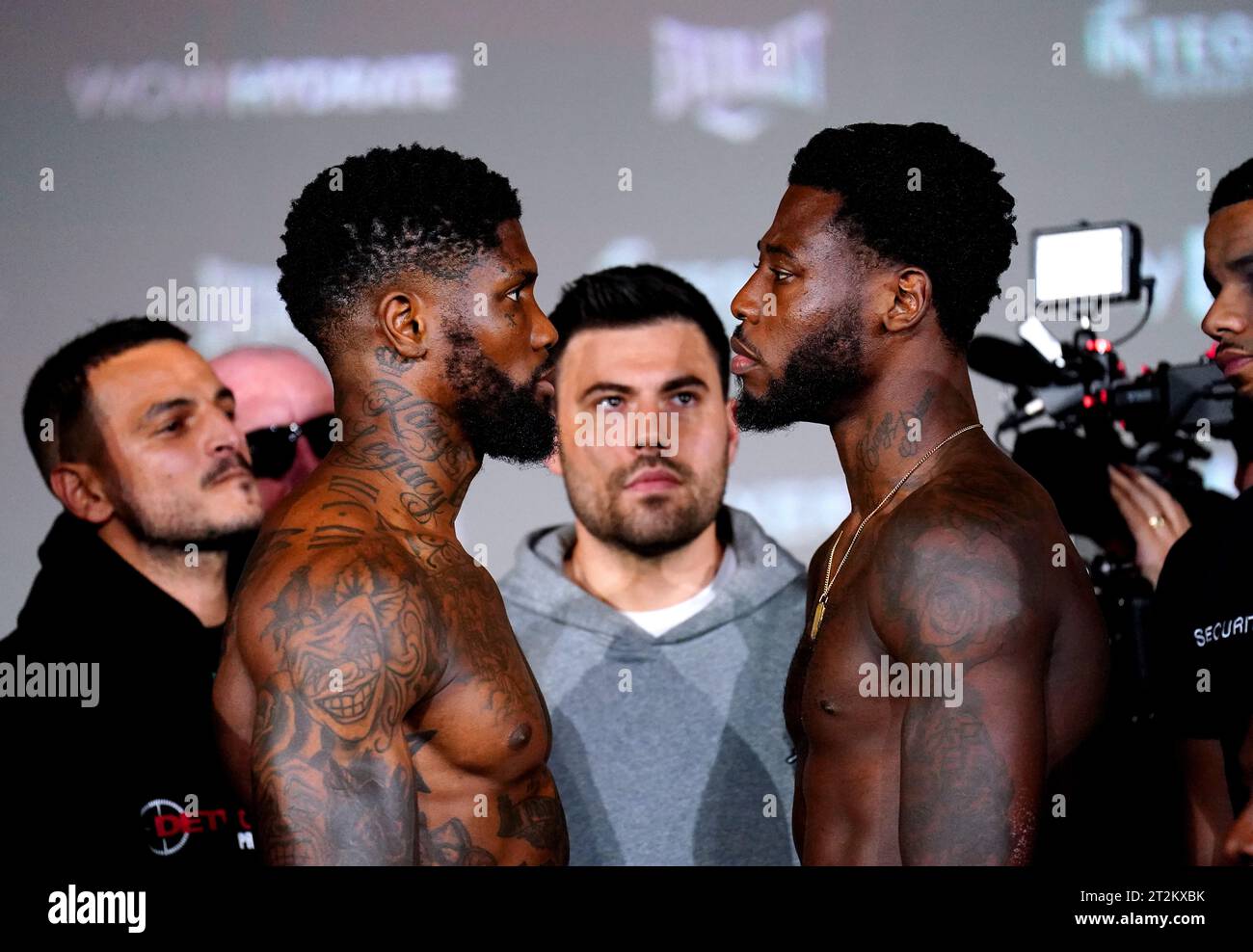 Mikael Lawal (left) and Isaac Chamberlain face off during a weigh-in at ...