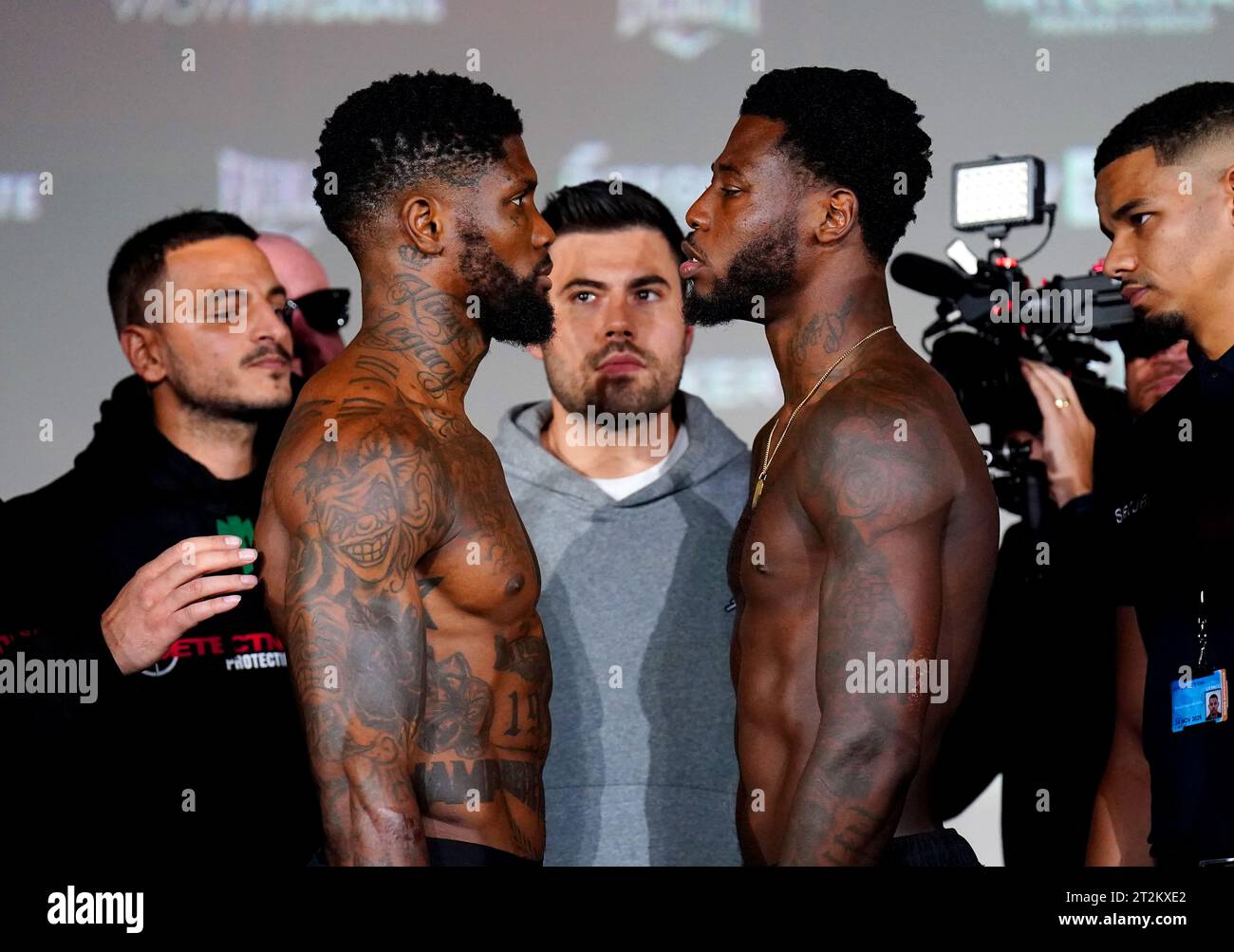 Mikael Lawal (left) and Isaac Chamberlain face off during a weigh-in at ...