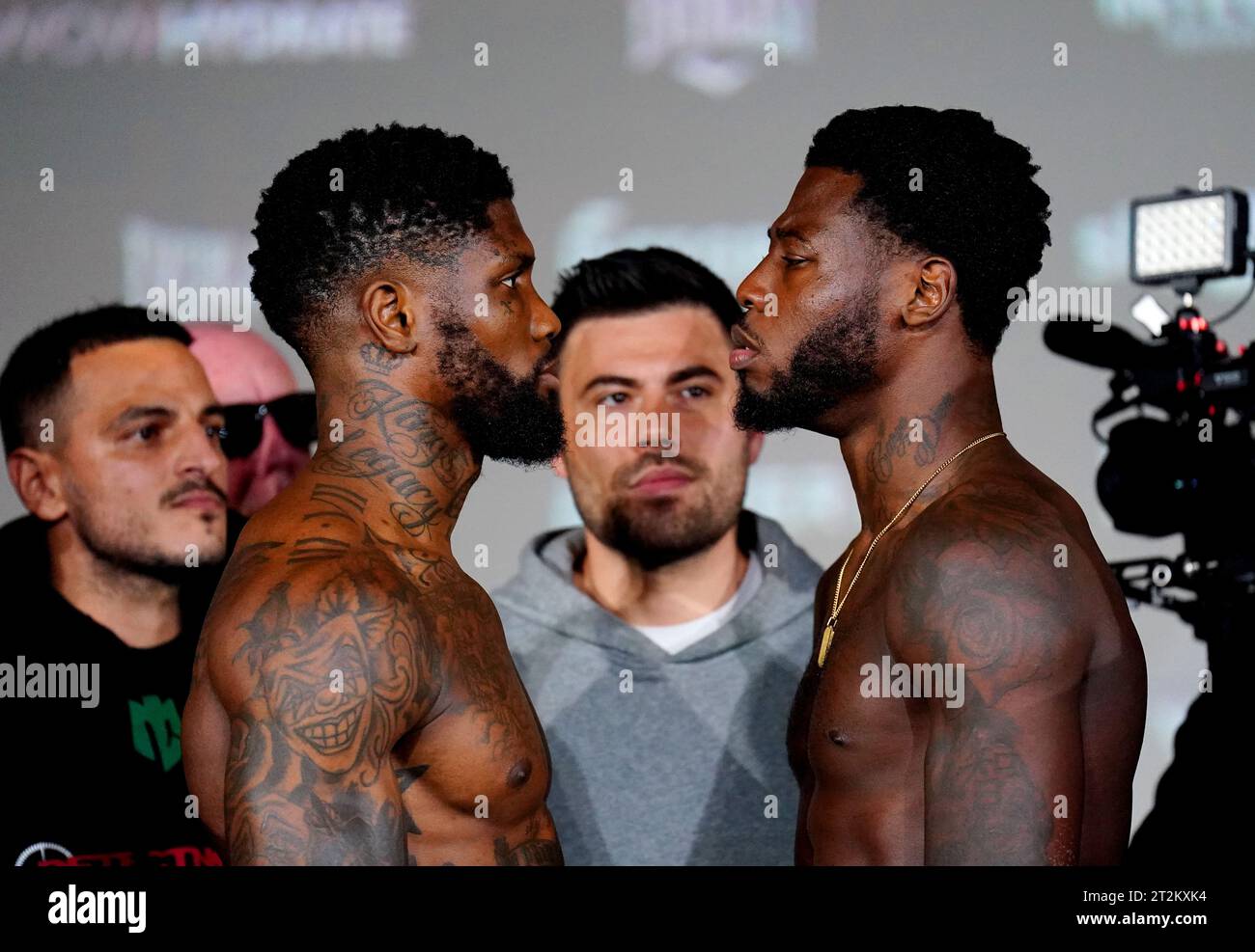 Mikael Lawal (left) and Isaac Chamberlain face off during a weigh-in at ...
