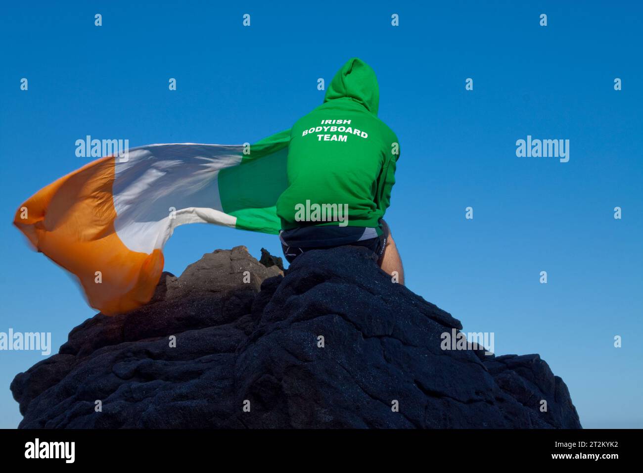 A member of the Irish Bodyboard Team watching ISA World Bodyboard ...