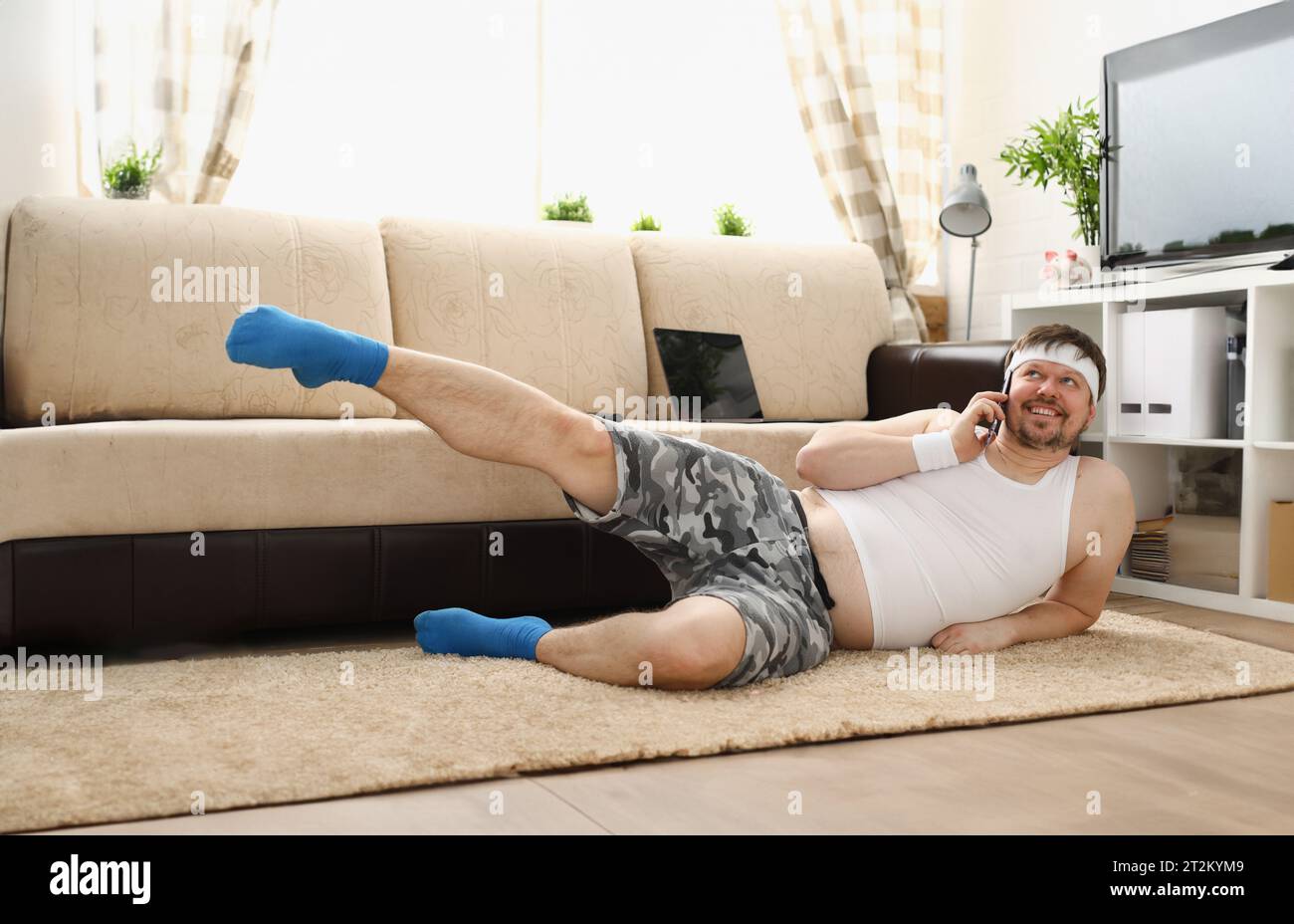 Fat man lies hi-res stock photography and images - Alamy