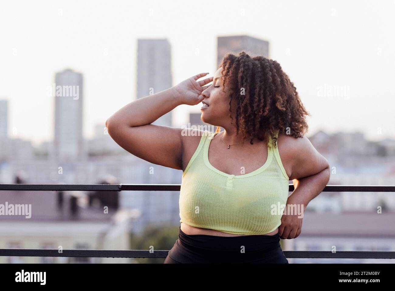 Close-up of portrait of young curvy attractive African. Charming dark ...