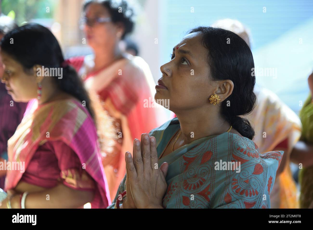 Kolkata, West Bengal, India. 20th Oct, 2023. A woman praying to the ...