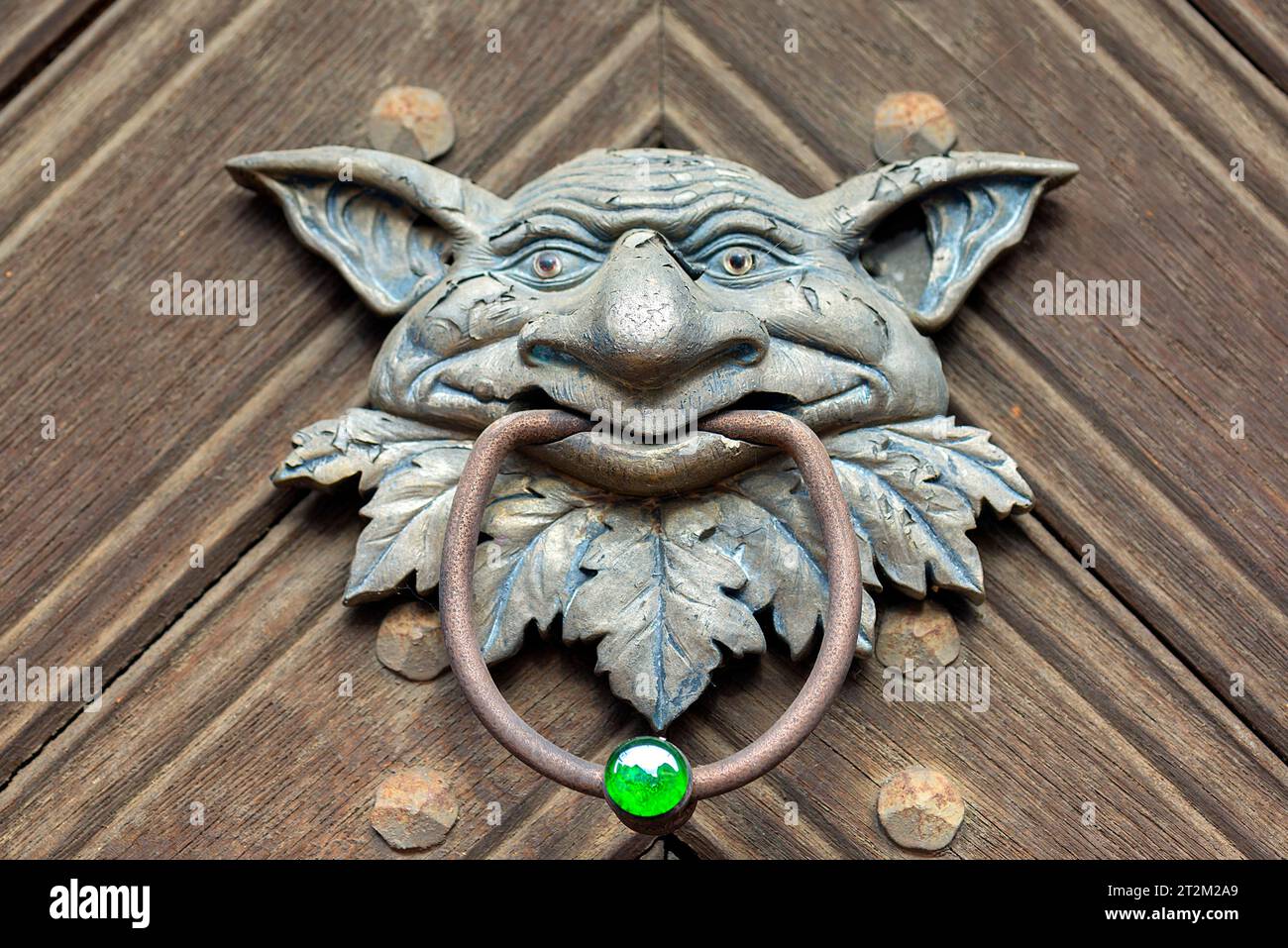 Grotesque as a door knocker on a front door, Baden-Wuerttemberg ...