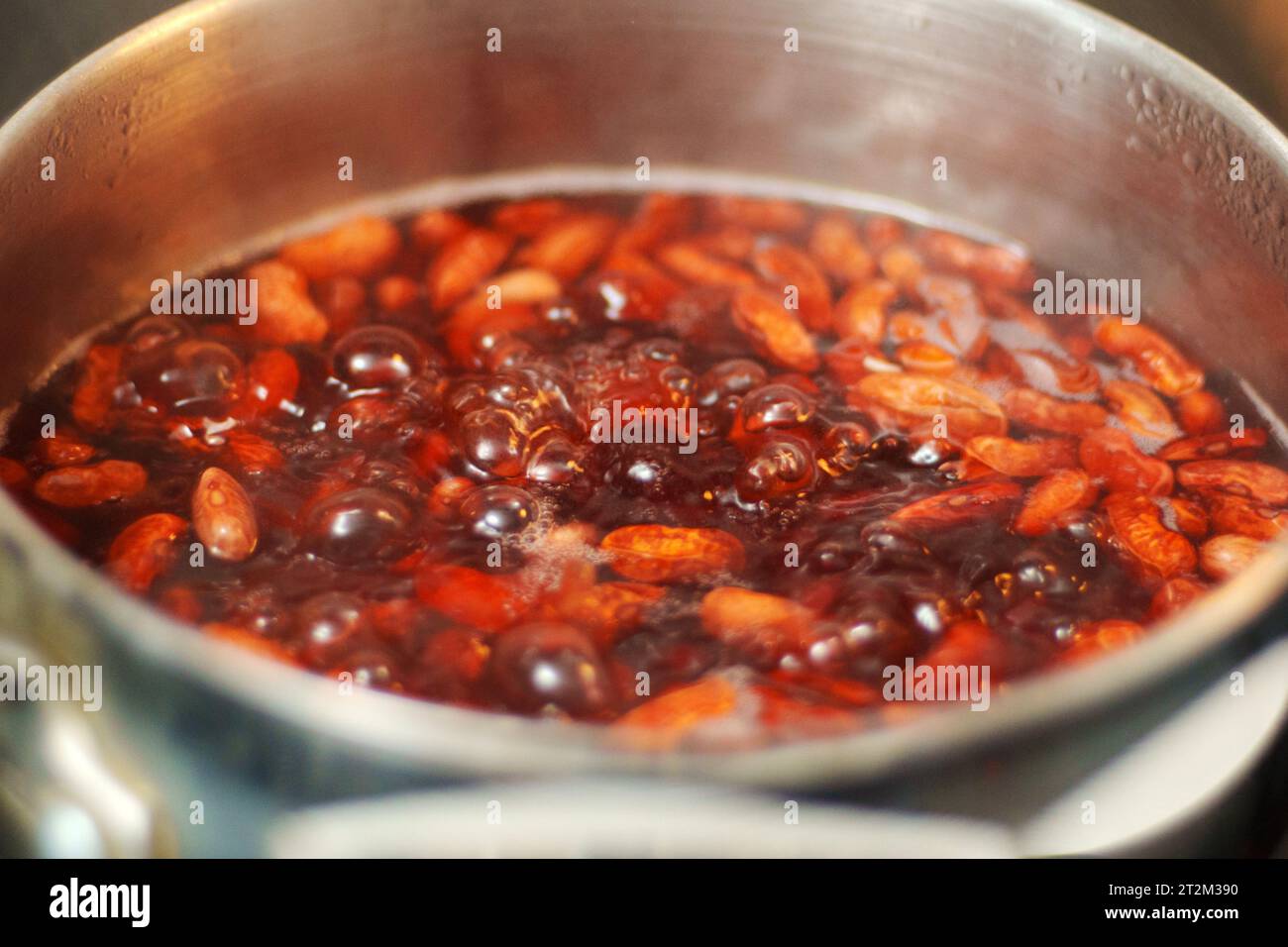 Beans are soaked in a pot for further cooking. Cooking, healthy ...