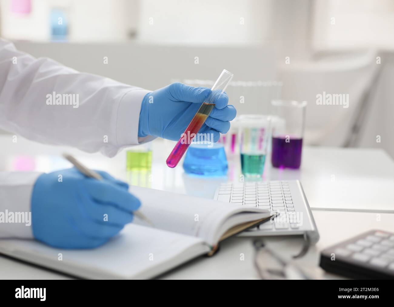 Employee of the chemical laboratory teacher Stock Photo - Alamy