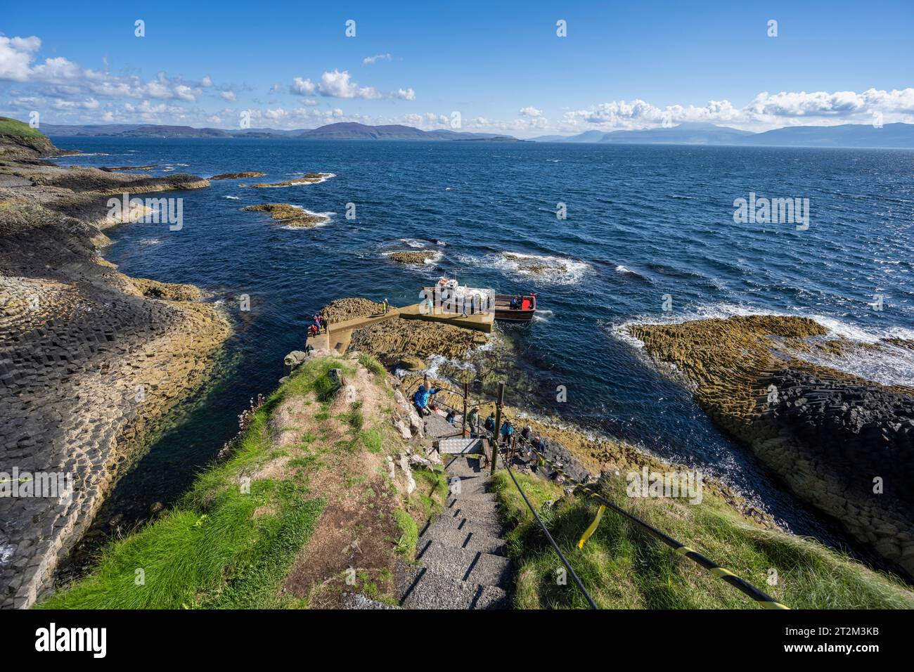 Jetty and steep stairway climb to the top of the uninhabited rocky ...