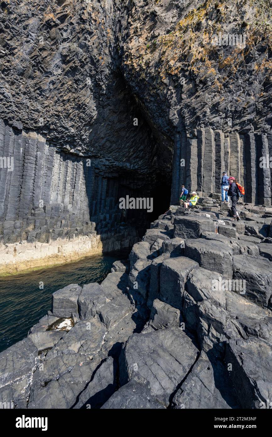 Tourists at the entrance to the 80 metre long and 10 metre wide Fingal ...