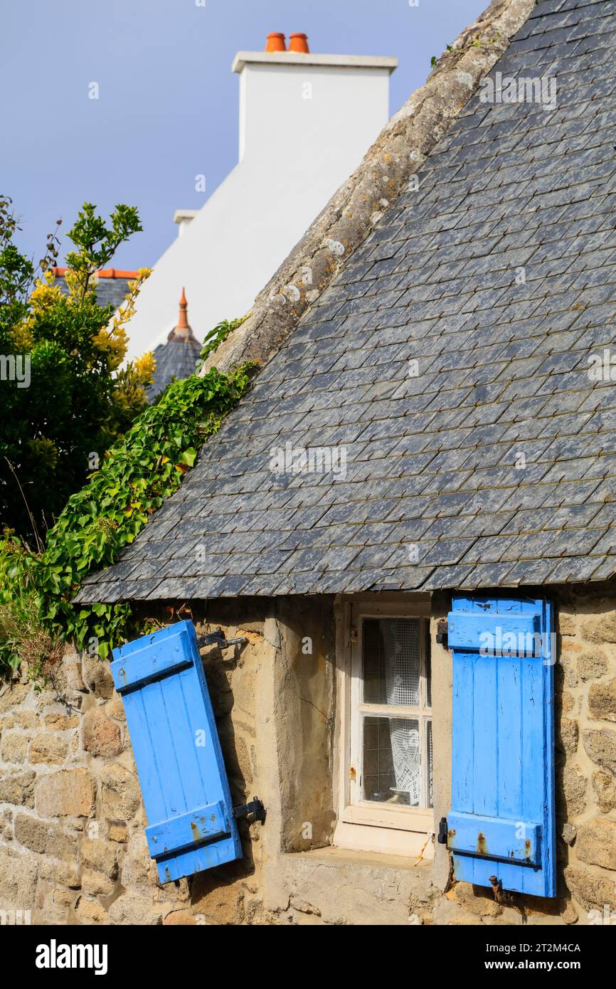 Stone house with blue shutters, Ile de Batz island in the English ...