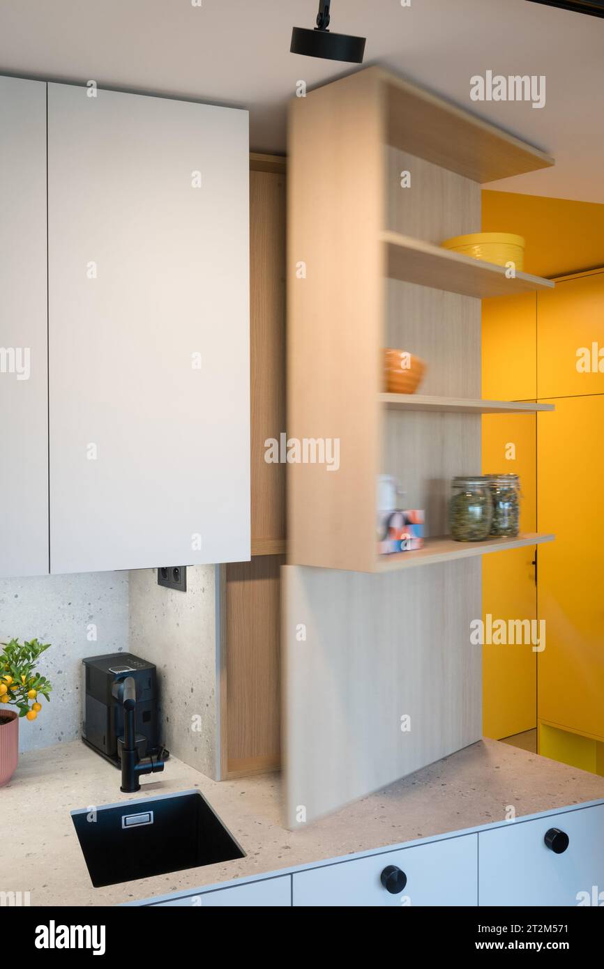 Custom kitchen cabinet with hidden circuit breaker box in small urban ...