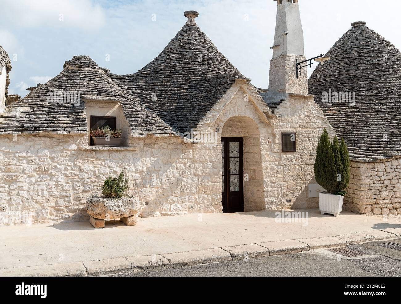 The trulli, typical limestone houses of Alberobello in southern Puglia ...
