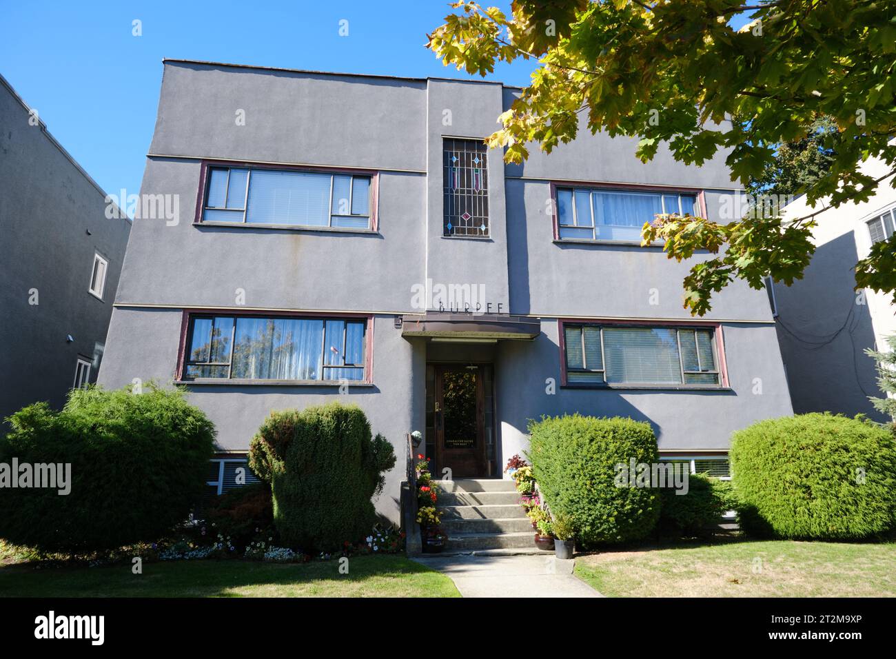 Typical apartment block, three stories high, on Cambie Street in ...