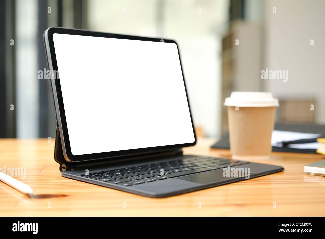 Portable computer, blank screen on desk Stock Photo - Alamy