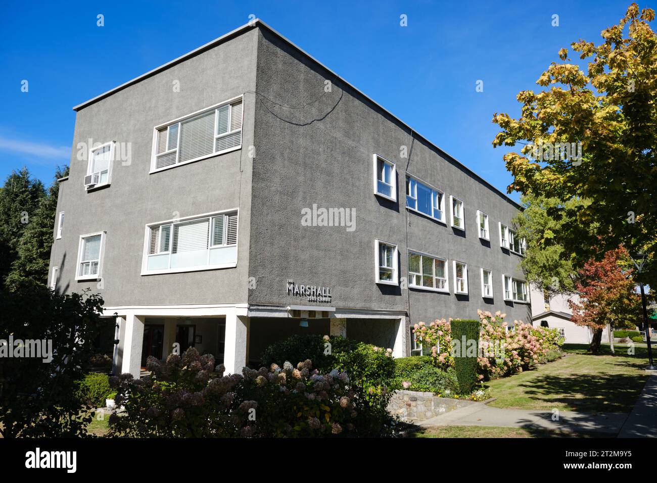 Typical apartment block, three stories high, on Cambie Street in ...