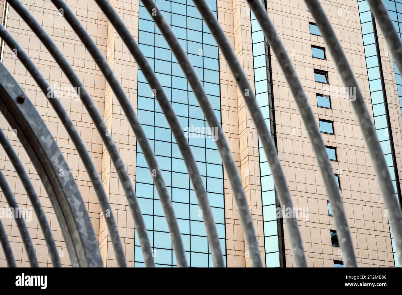 Building buildings behind a metal fence hi-res stock photography and ...