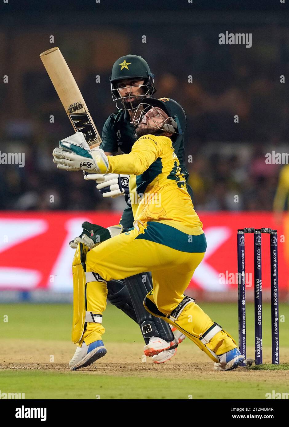 Australia's Josh Inglis looks at the ball played by Pakistan's Abdullah ...