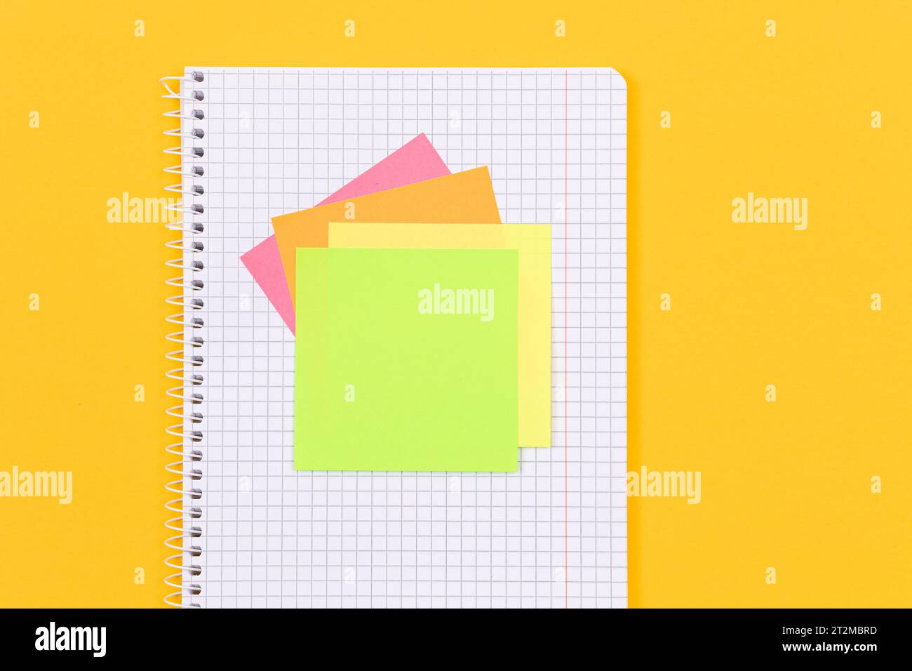 A Notepad with Sticky Notes Lying on Yellow Table - Blank Template. Top ...