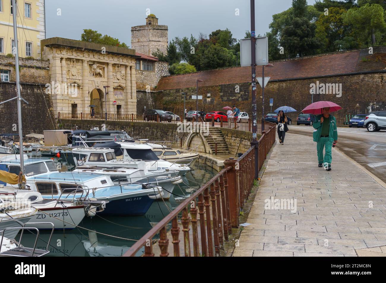 Old town city gate (land gate) and harbor with boats in Zadar, Croatia ...