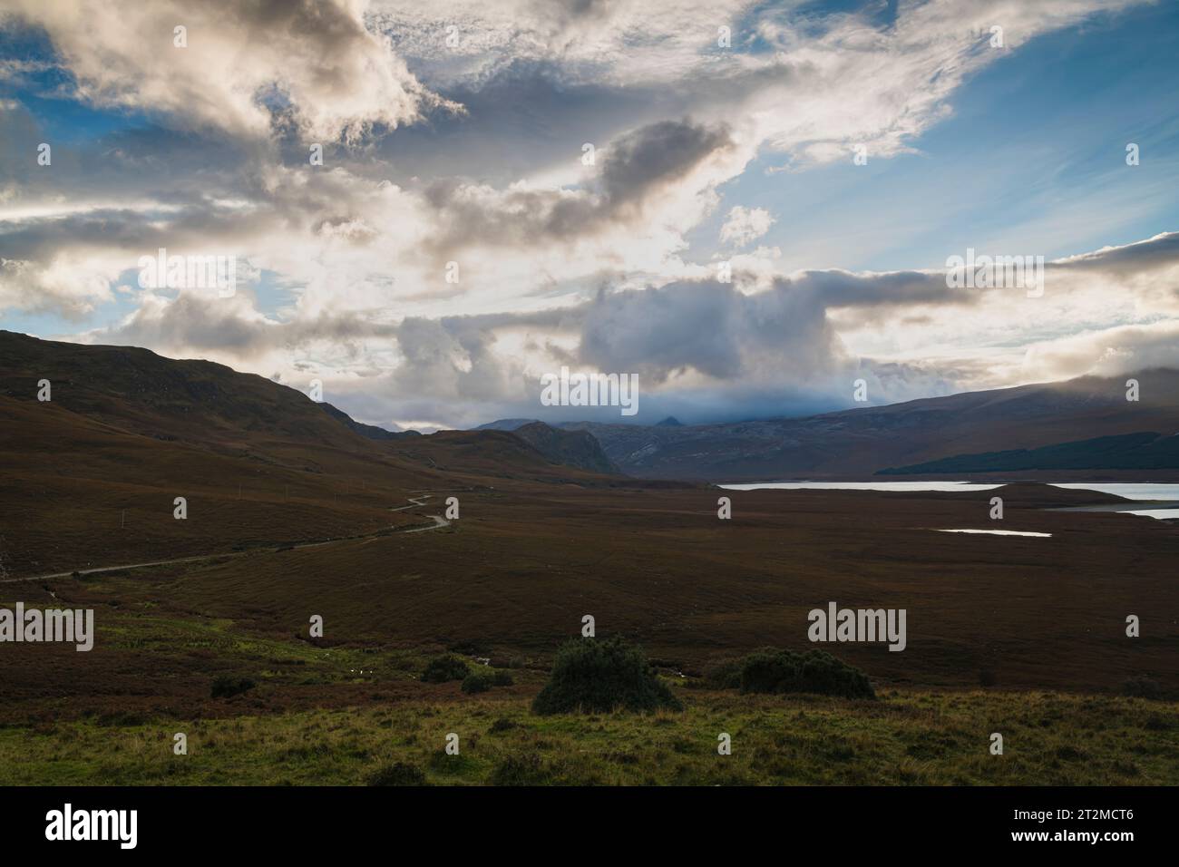 A dramatic, autumnal HDR image of the winding road and landscape around ...