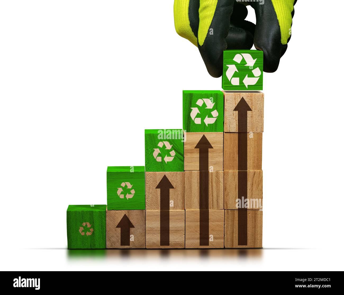 Gloved hand arranging wood blocks with green Recycling Symbols and ...