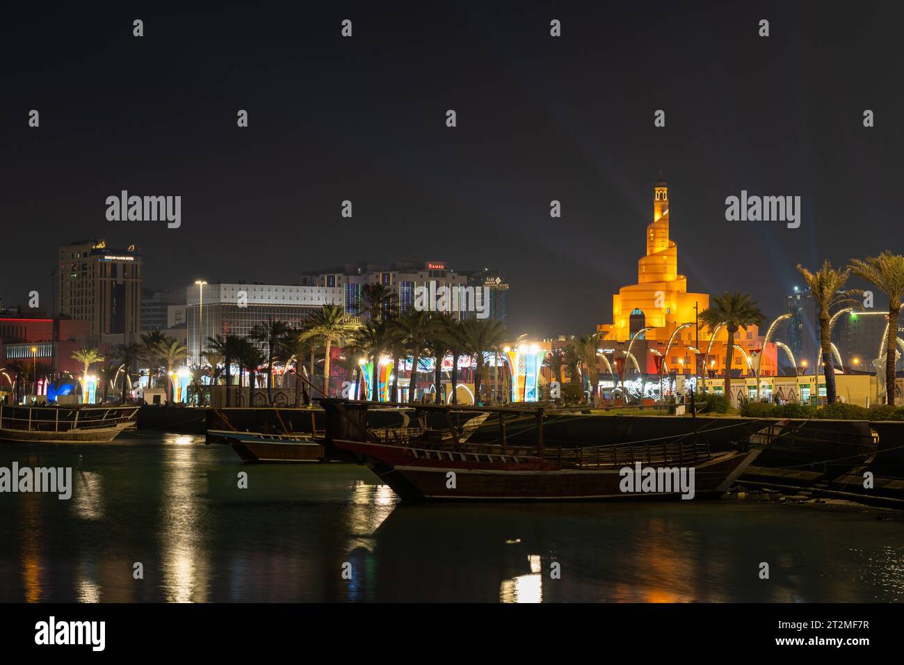 Doha, Qatar - December 3, 2022: Traditional wooden dhow anchored at ...