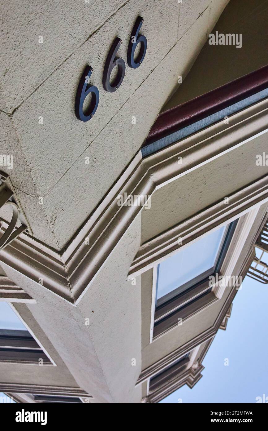 666 or 999 on building upward corner view with overcast sky Stock Photo ...