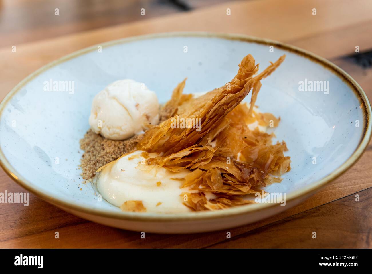 Delicious Greek sweet and crispy pastry named Galaktoboureko Stock ...