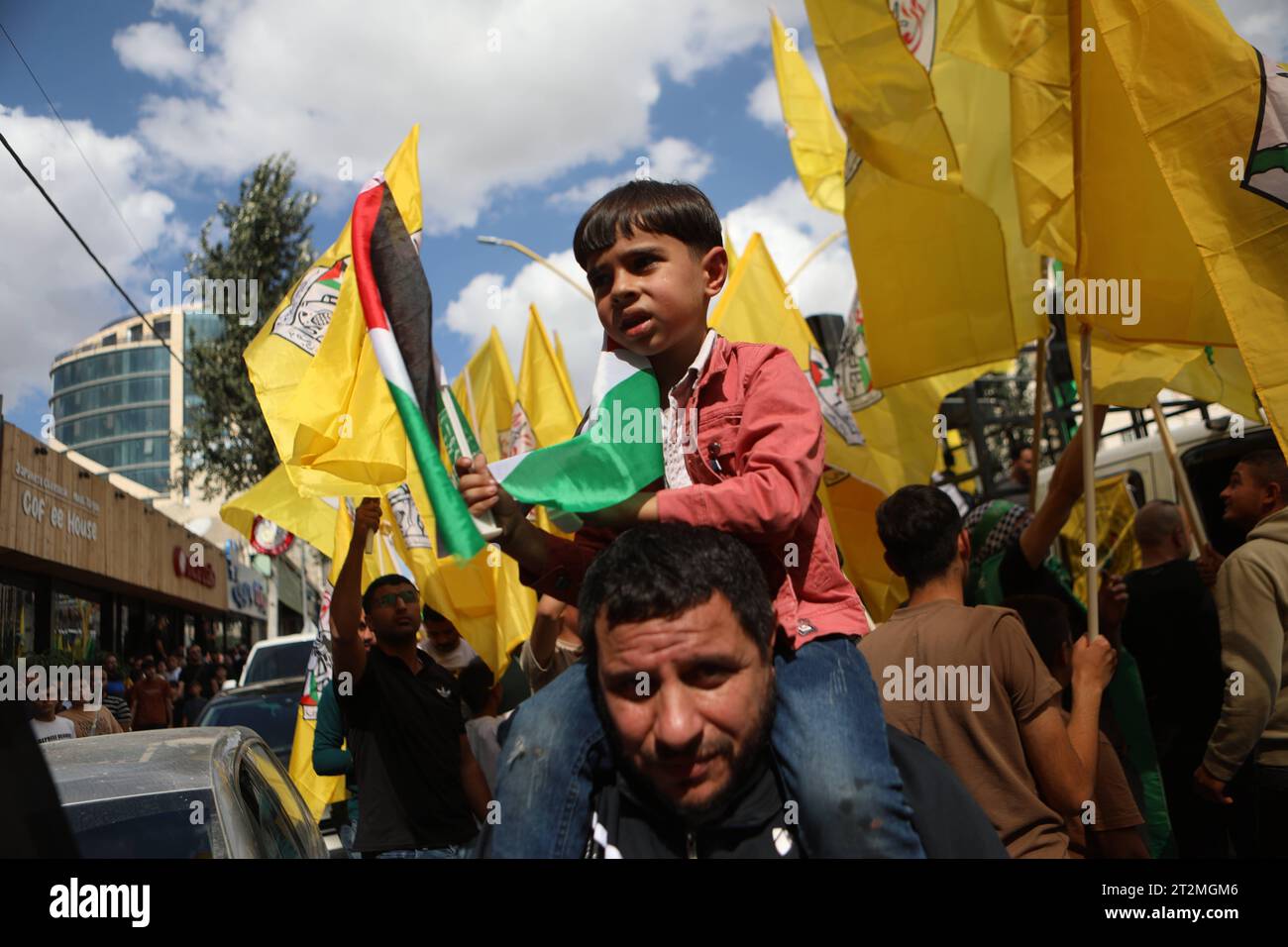People wave Russian and Palestinian flags as they take to the streets ...