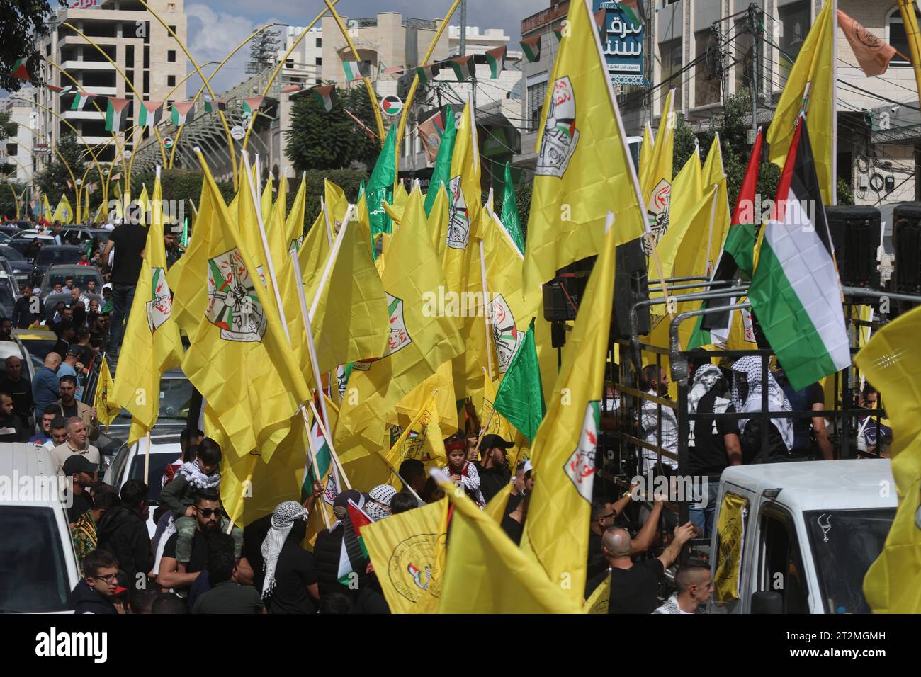 People wave Russian and Palestinian flags as they take to the streets ...