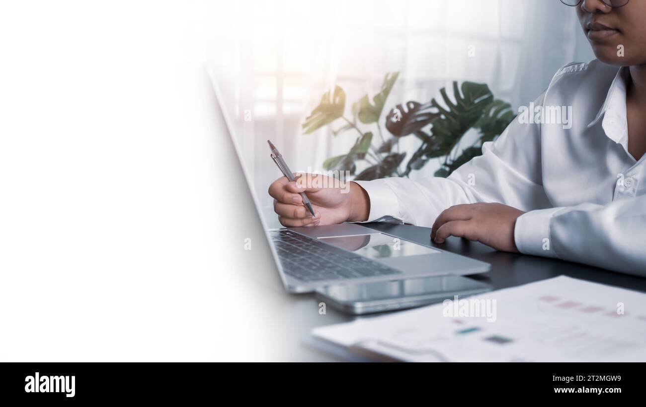 Businesswoman use computers to analyze business and manage corporate ...