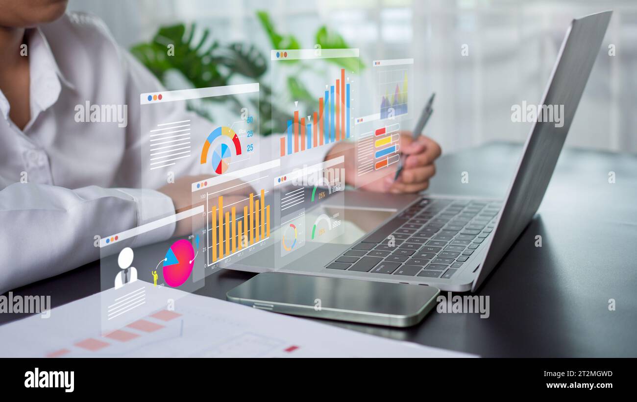 Businesswoman use computers to analyze business and manage corporate ...