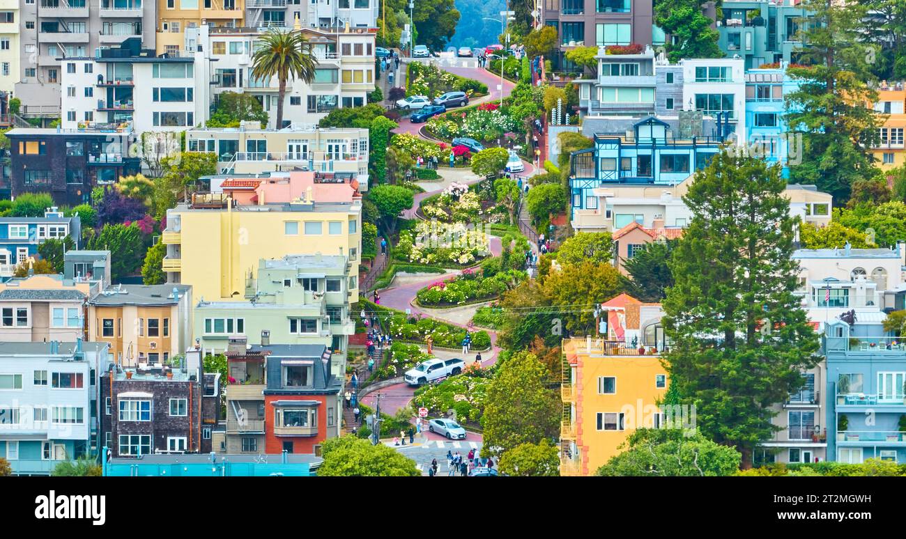 Aerial full road of iconic Lombard Street with cars and people winding ...