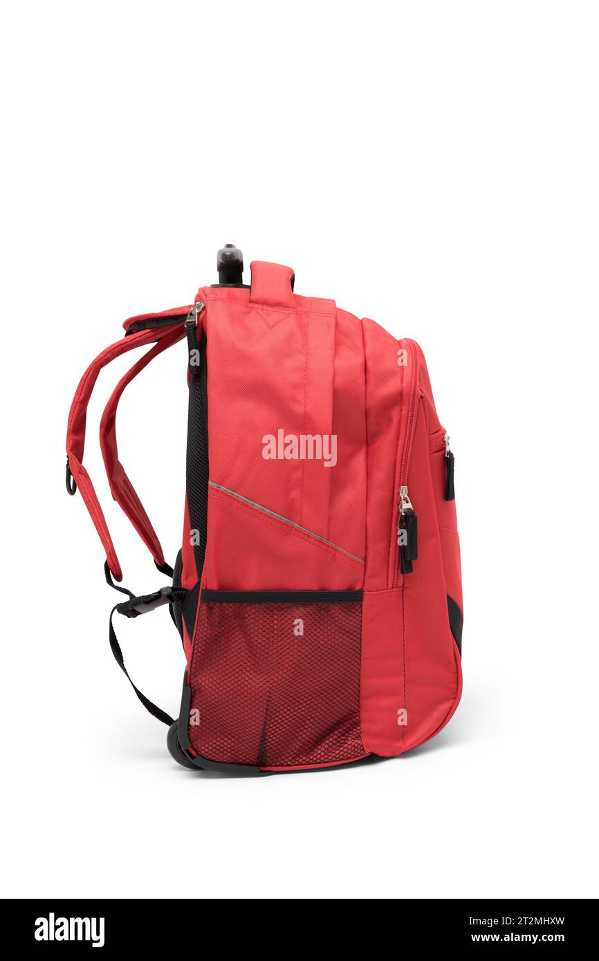 rolling red backpack isolated on white background. travel daypack with ...