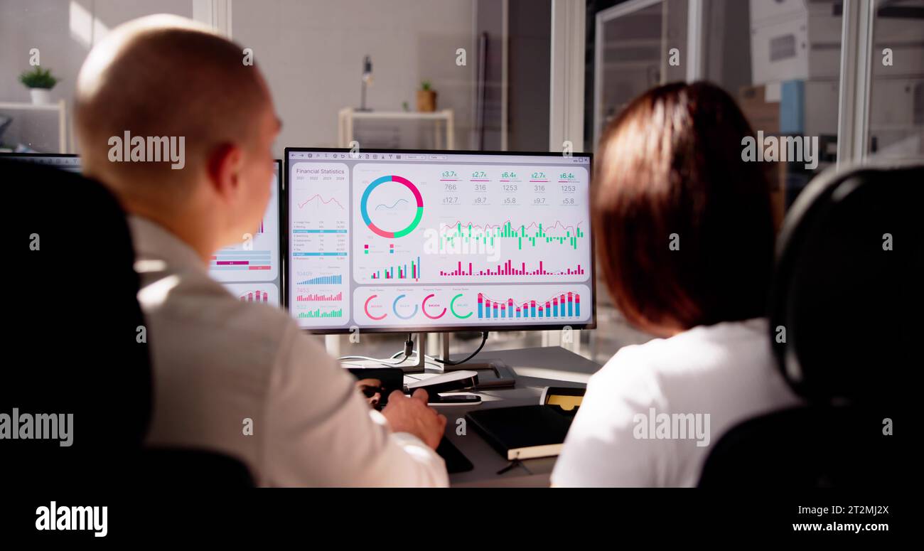 Two male financial analytics working hi-res stock photography and ...
