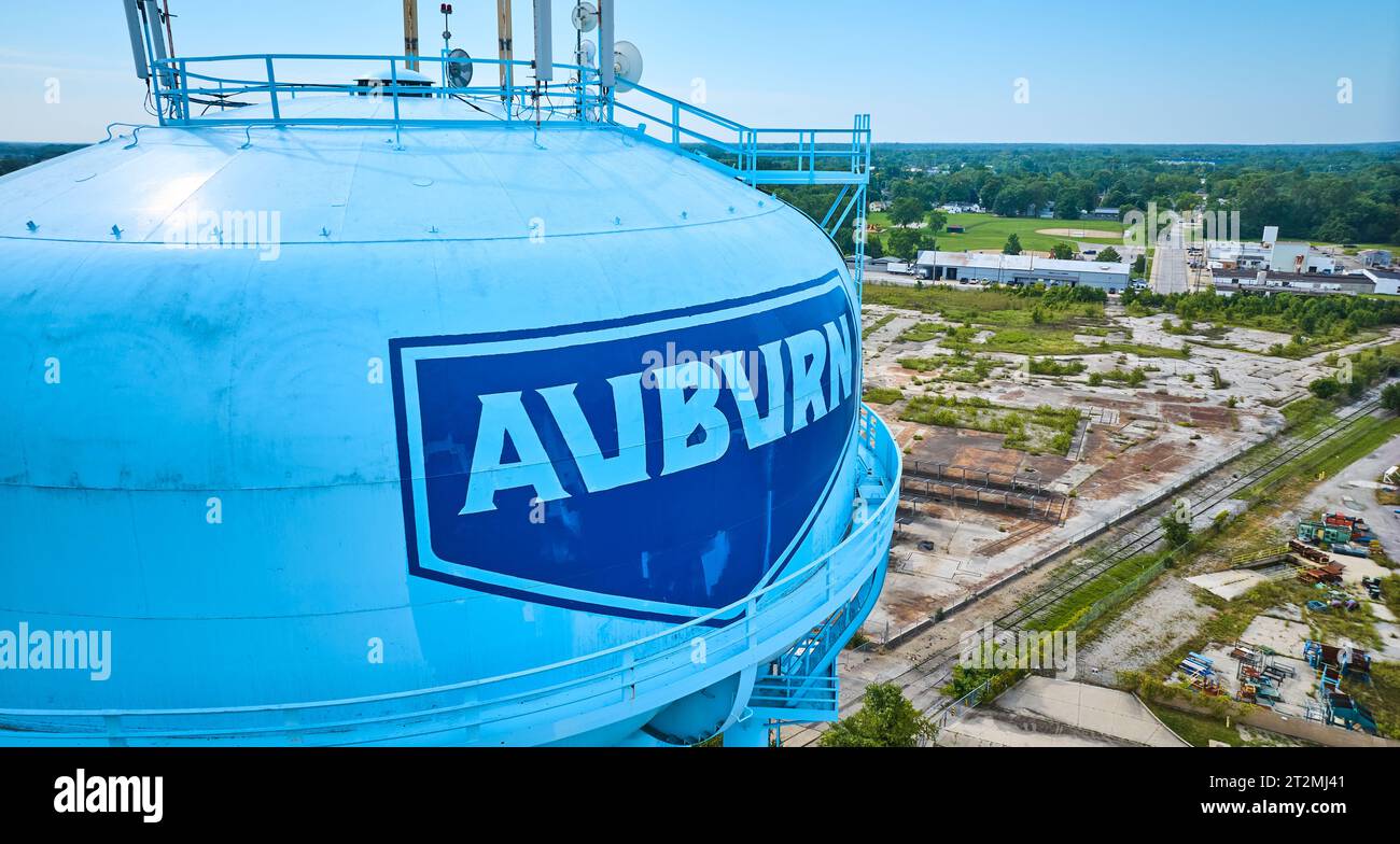 Close up side view of Auburn water tower with railroad tracks in ...