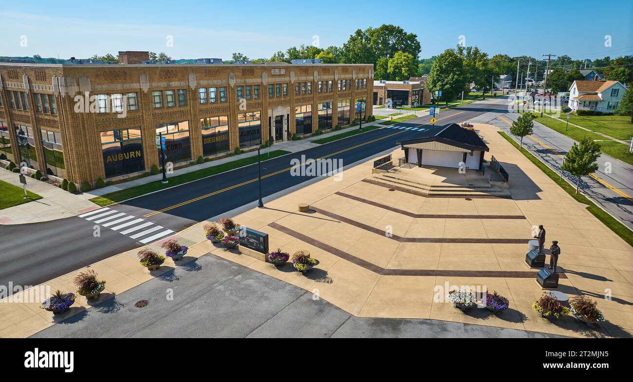 Aerial main entrance to ACD Automobile Museum with statues of Augie and ...