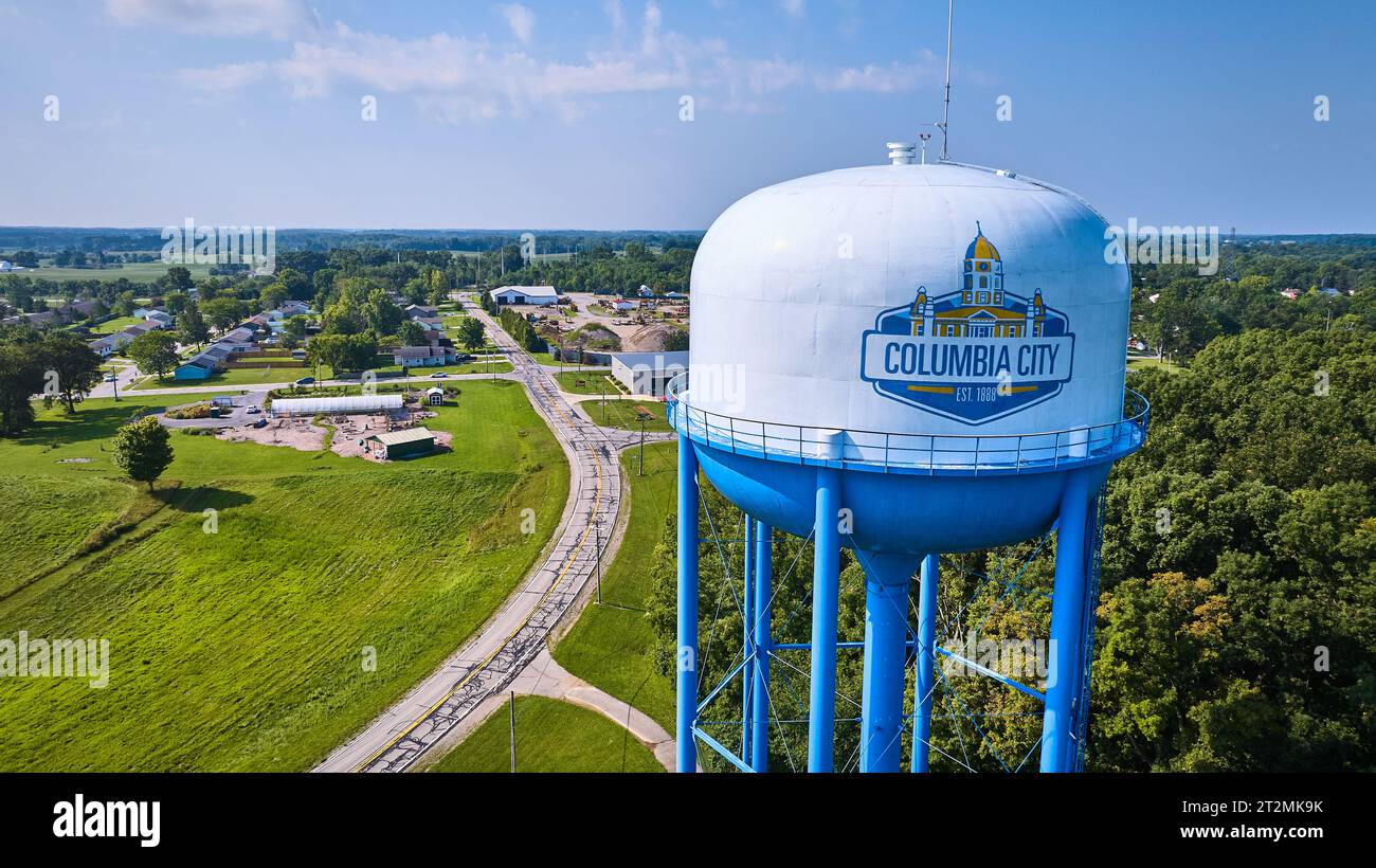 Close up aerial Columbia City water tower with neighborhood and ...