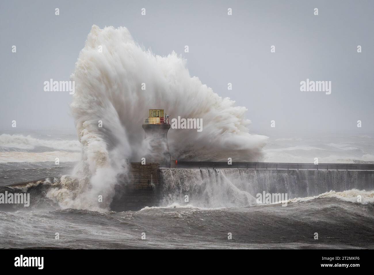 Huge storm Babet waves smashing into a damaged South Shields lighthouse ...